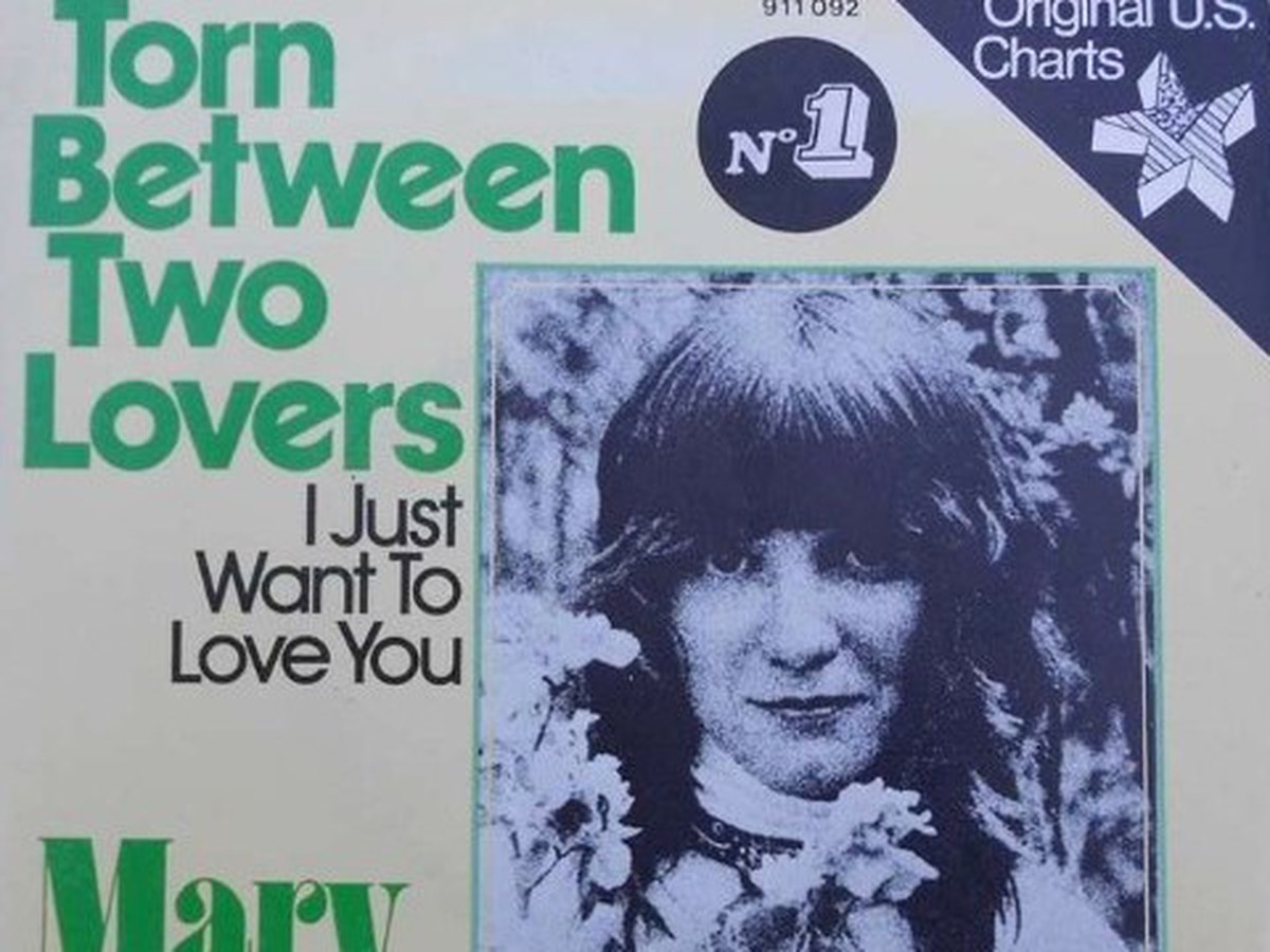 'Torn Between Two Lovers': Bài hát 'giằng xé' hôn nhân